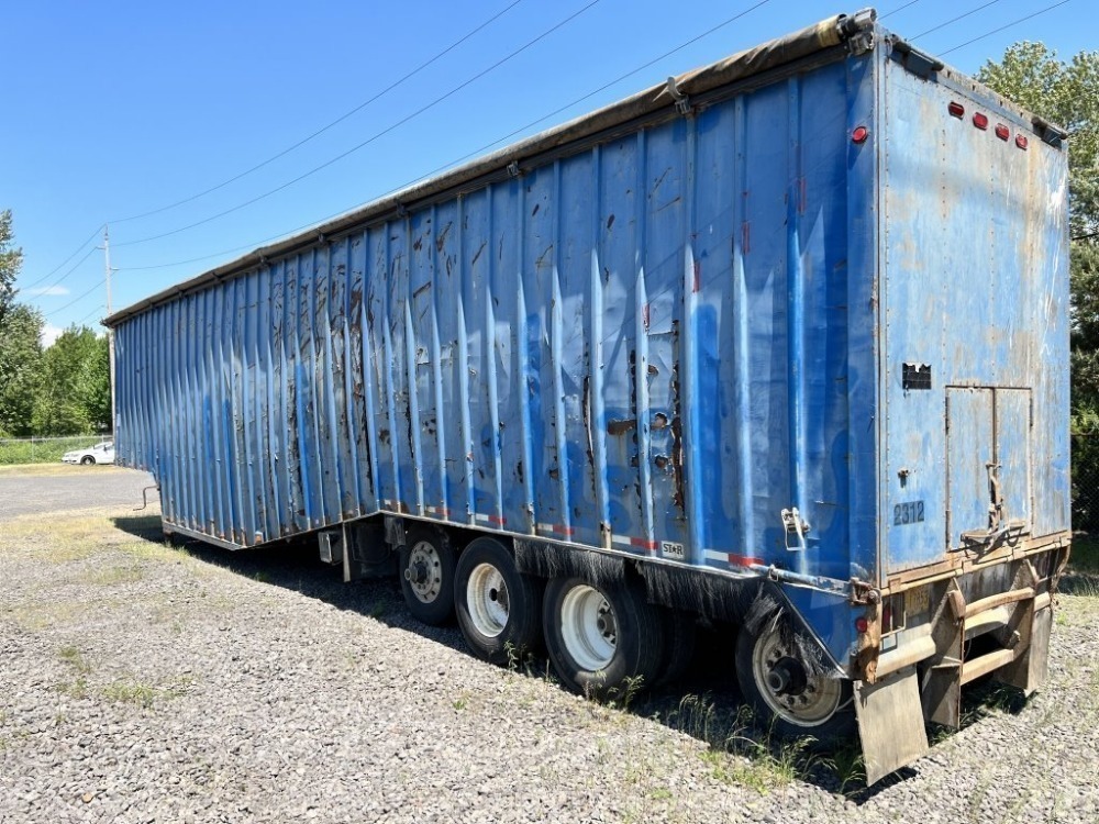 2006 Star Quad-Axle Possum Belly Chip Trailer | J. Stout Auction