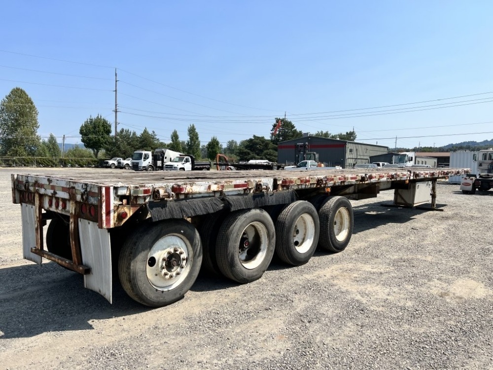 1975 Aztec Quad-Axle Flatbed Trailer | J. Stout Auction
