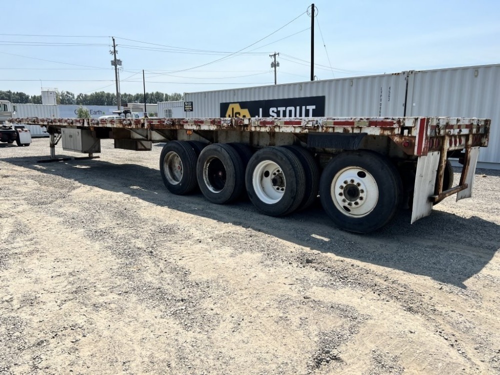 1975 Aztec Quad-Axle Flatbed Trailer | J. Stout Auction